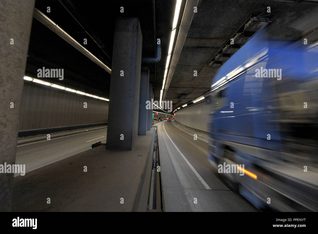 A truck rides in the Petuel Tunnel at the Petuelring Stock Photo - Alamy