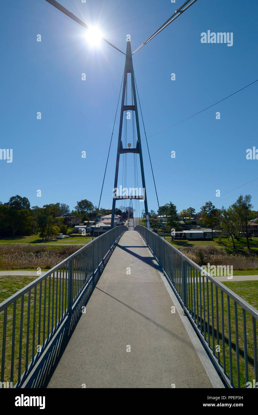 Pedestrian suspension bridge that crosses the MacIntyre River joining ...