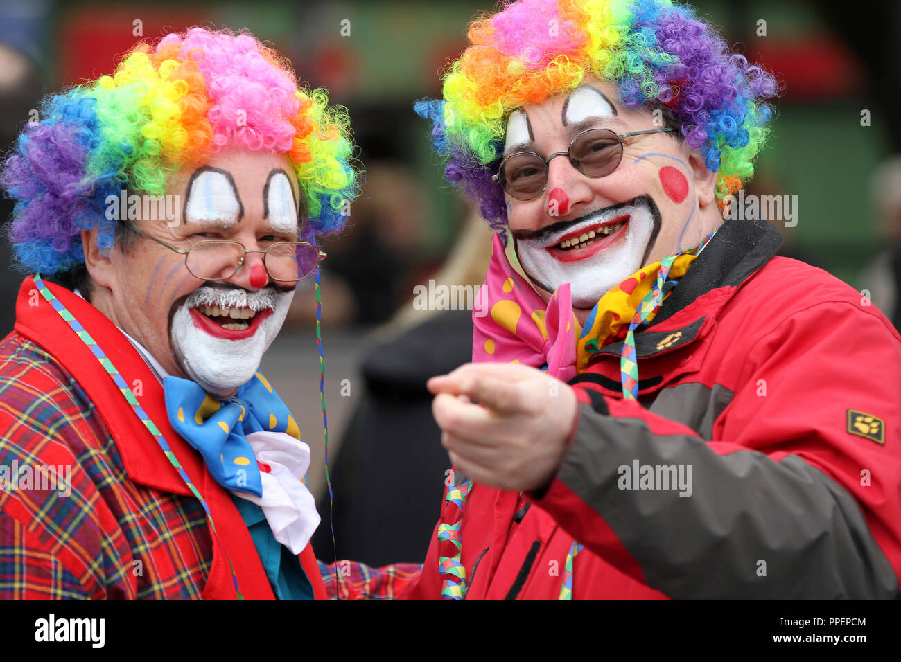 Two men dressed up as clowns on Shrove Tuesday in the center of Munich ...