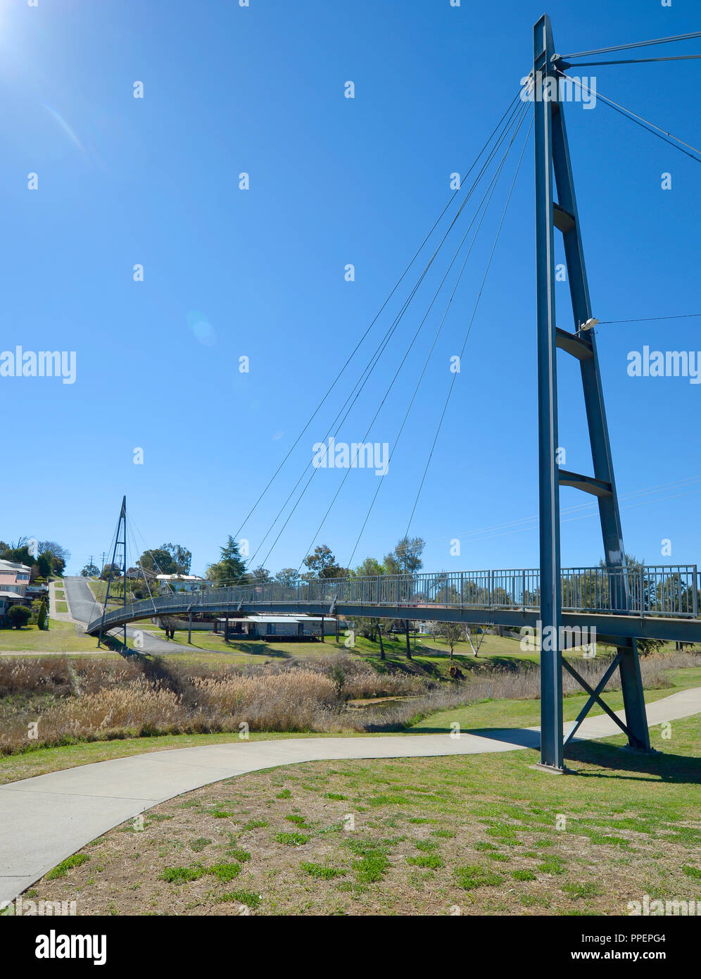 Pedestrian suspension bridge that crosses the MacIntyre River joining ...