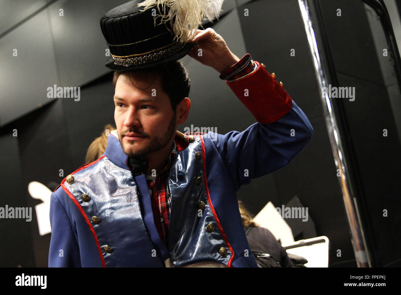 Man in costume at the uniform sale of the Bavarian State Opera, Munich ...