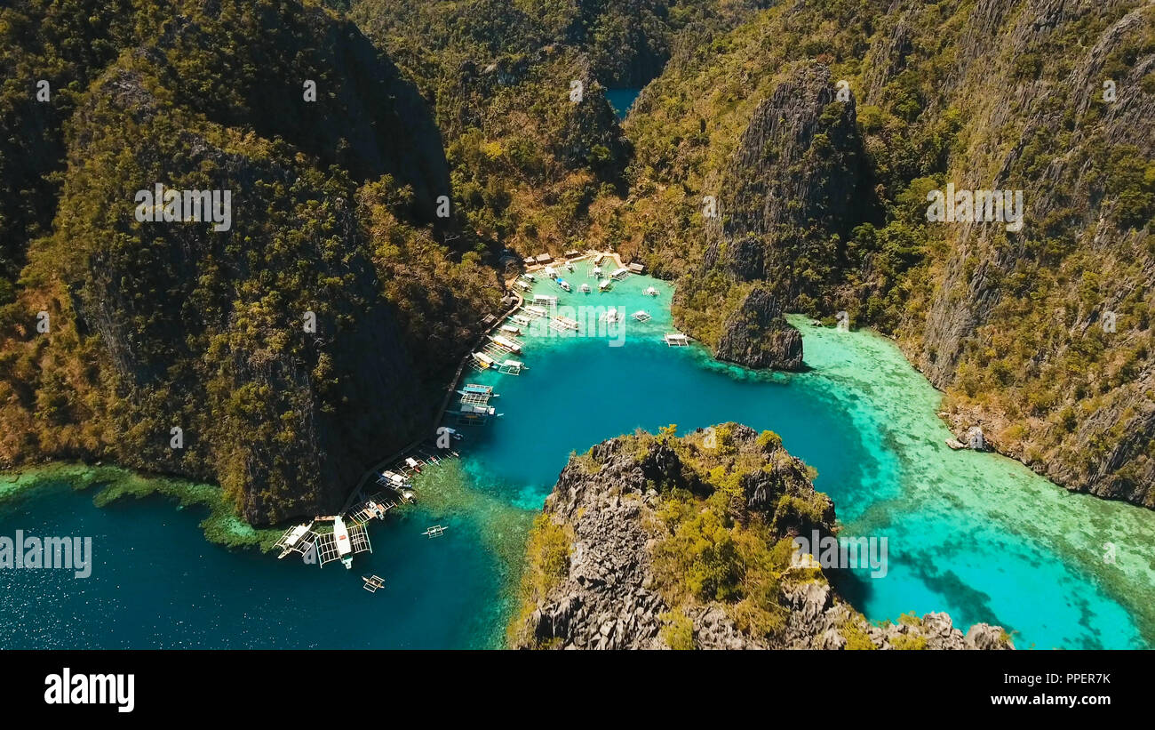 Tropical lagoon with azure water, beach by the Kayangan Lake ...