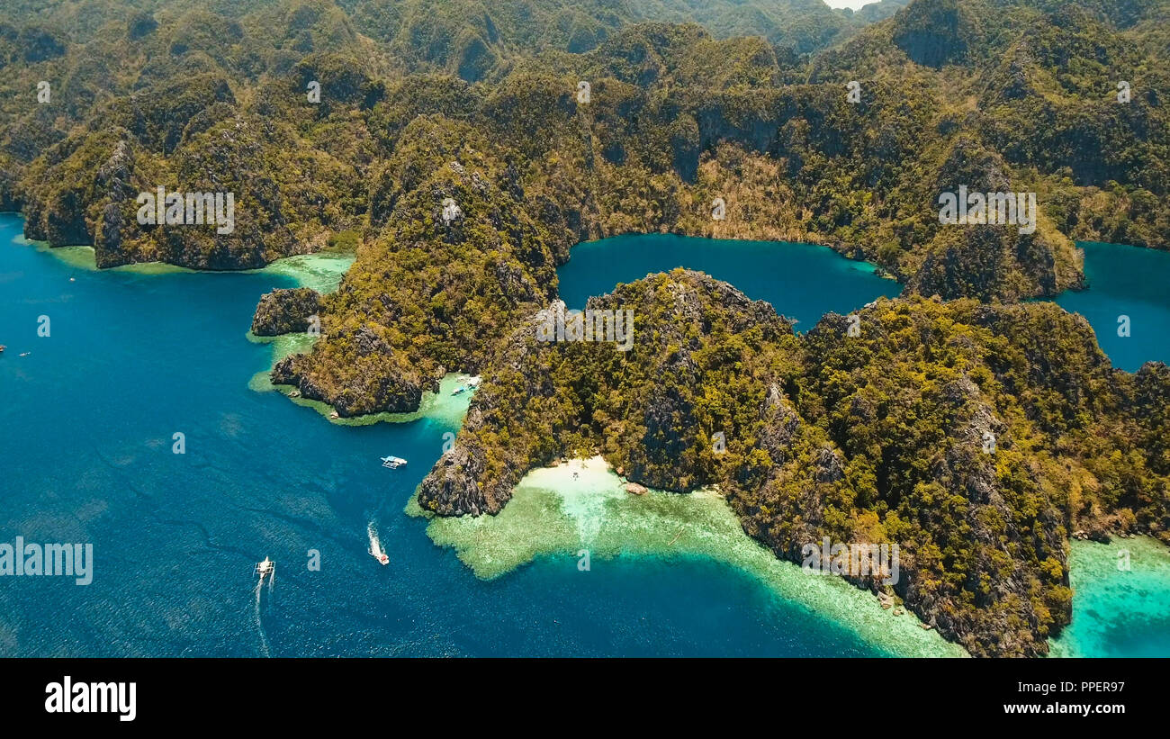 Aerial view: Lagoon with blue, azure water in the middle of small ...