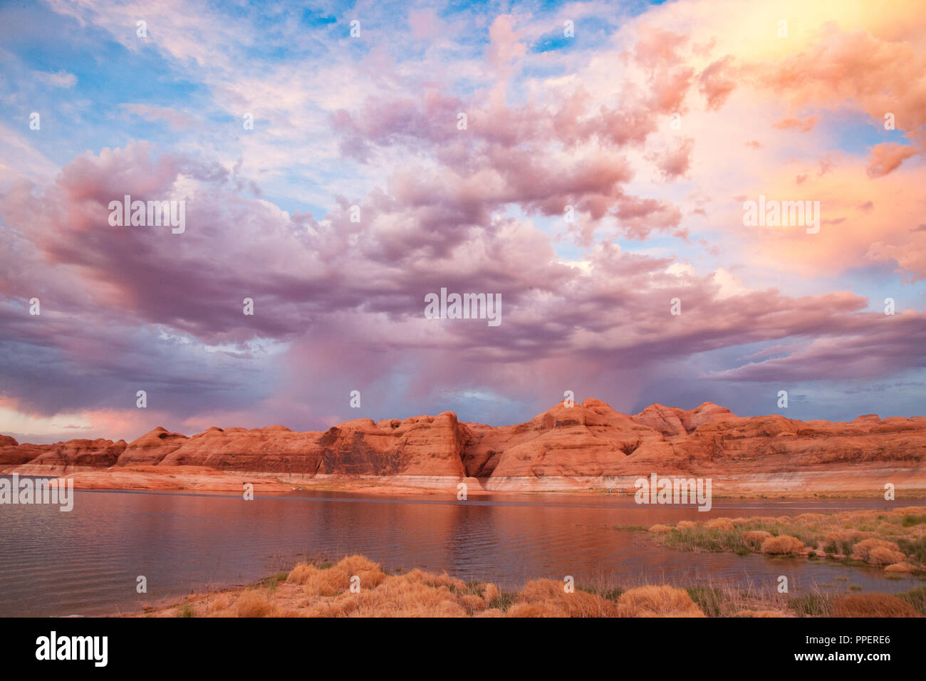 Storm clouds at sunset over Lake Powell in the Glen Canyon National ...