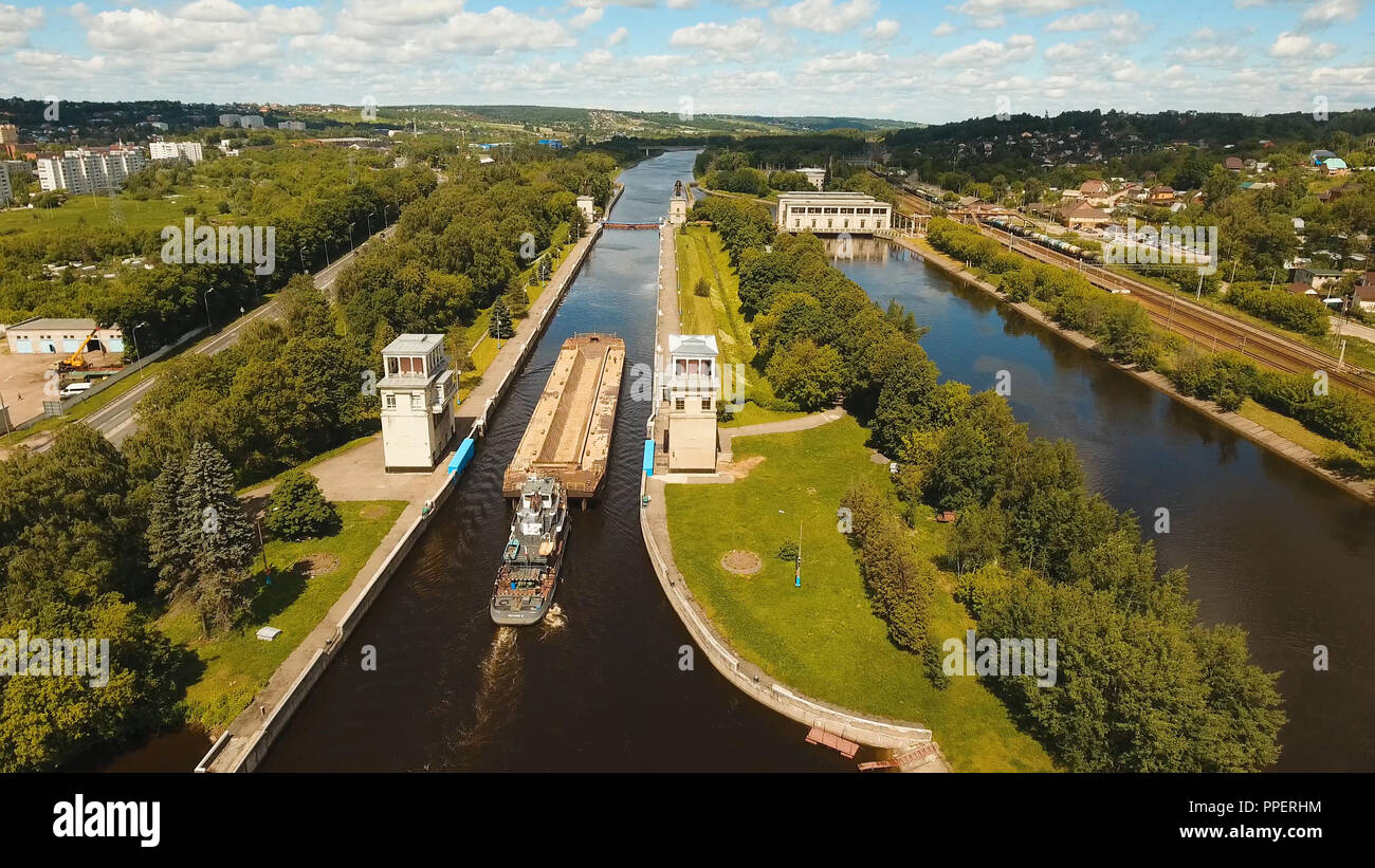 Sluice Gates on the River. Aerial view barge, ship in the river gateway ...