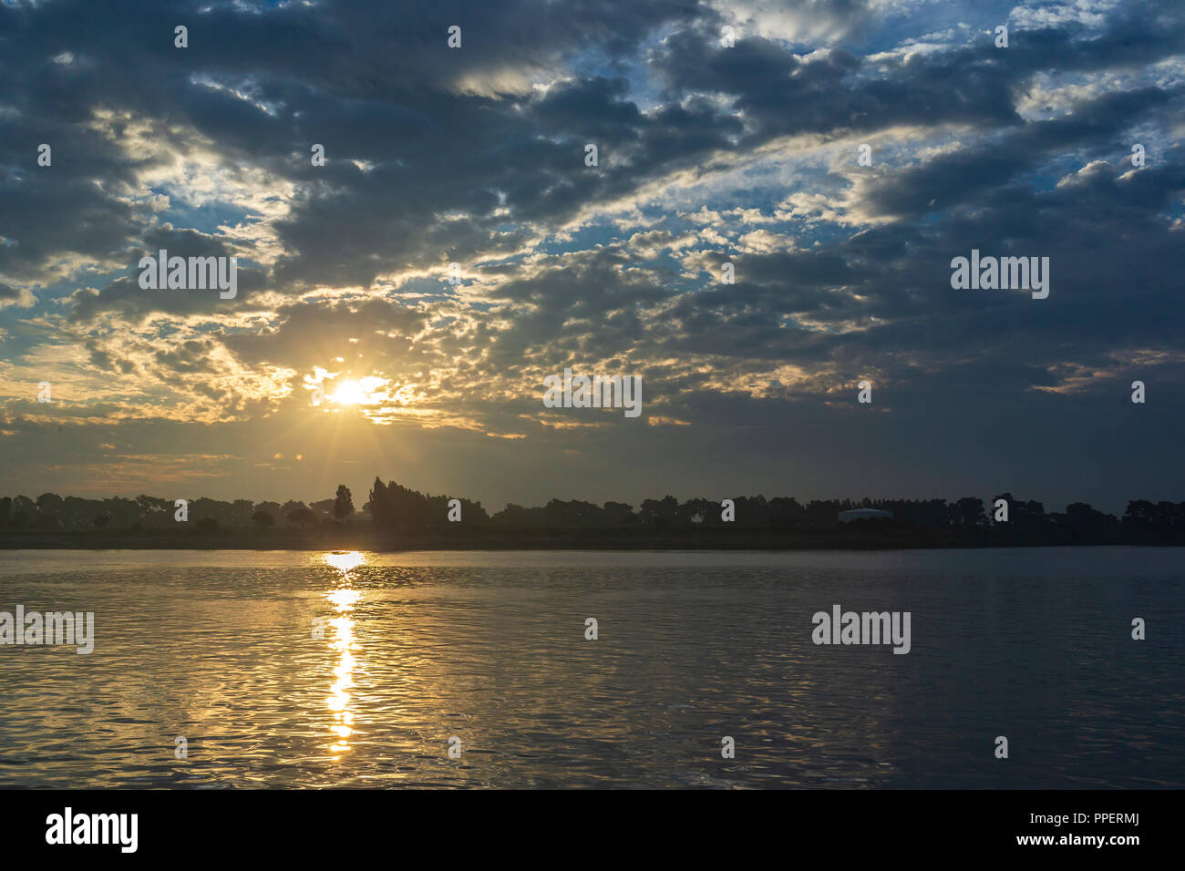 Dark early morning sky scene Stock Photo - Alamy