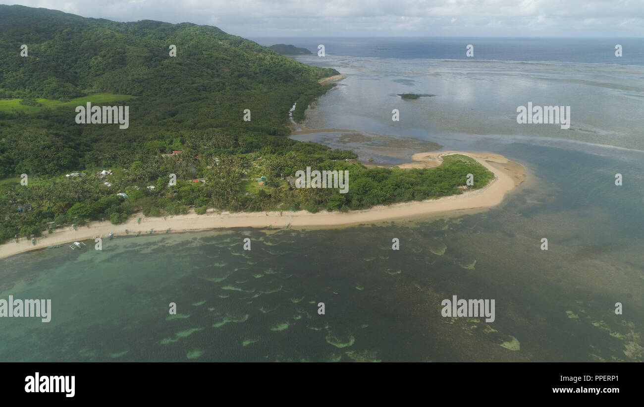 Aerial view of beautiful tropical beach with turquoise water in blue ...