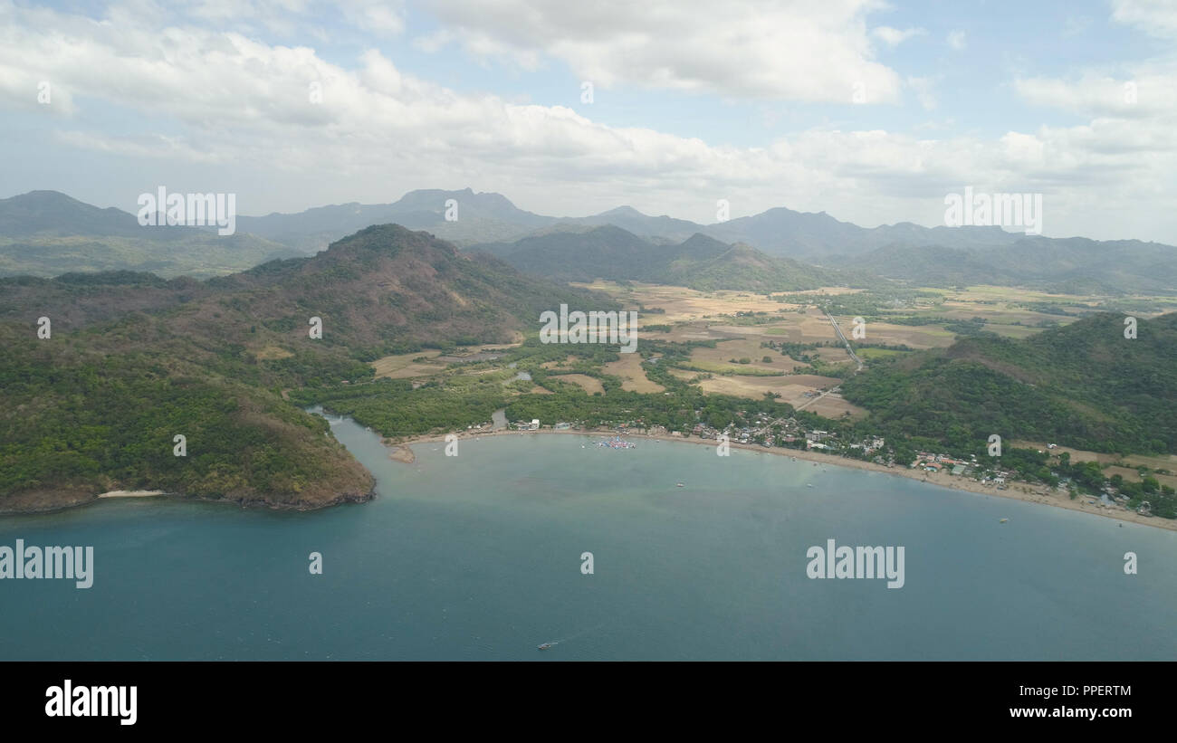 Aerial view of seashore with beach, lagoons and coral reefs ...
