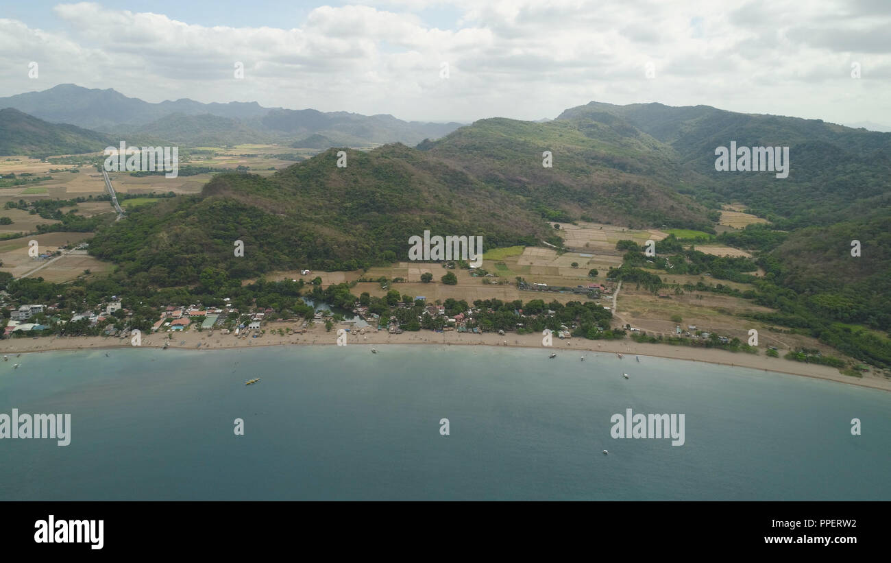 Aerial view of seashore with beach, lagoons and coral reefs ...