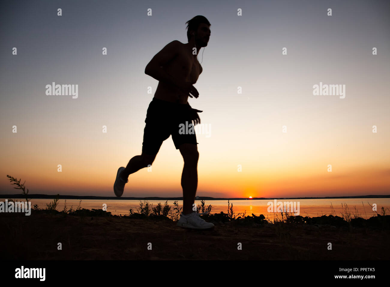 Running man silhouette in sunset time. Sport and active life concept ...