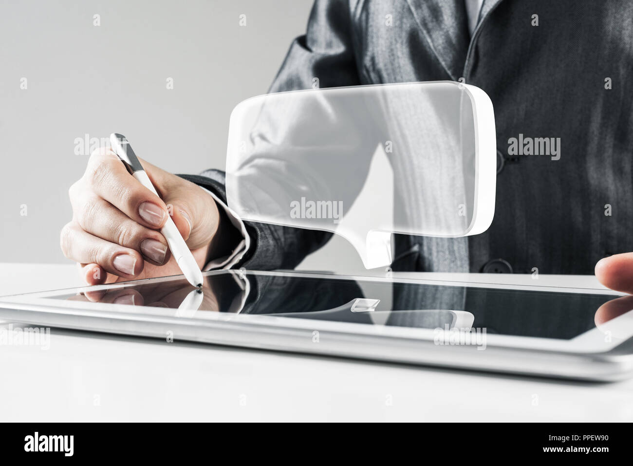 Female hands using graphics tablet and glass icons fly in air. M Stock ...