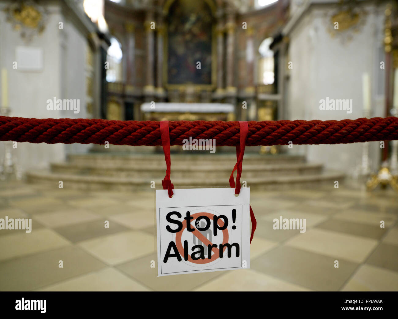 Sign saying "Stop! Alarm" at the entrance to the sanctuary in the ...