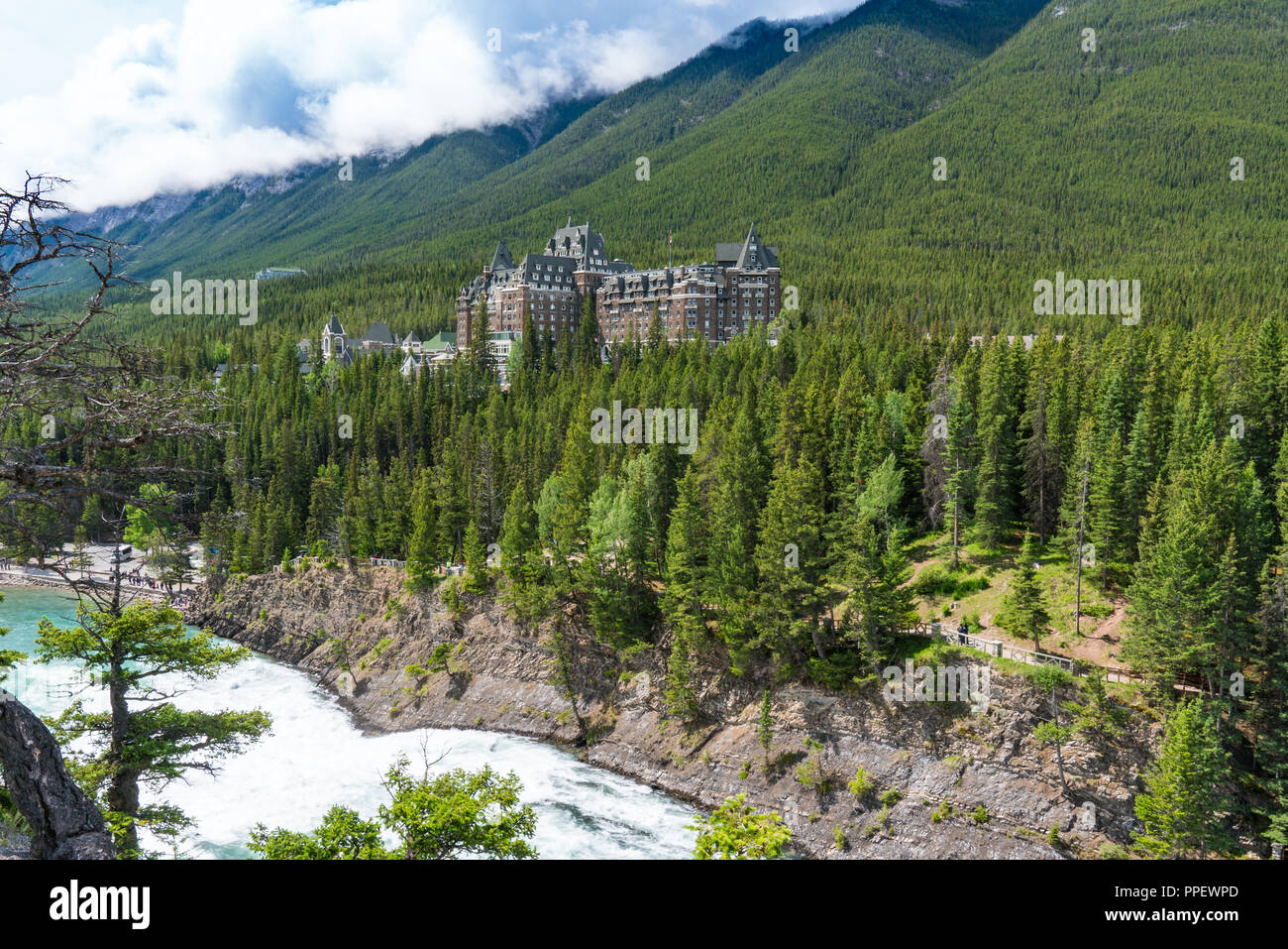 BANFF, CANADA - JULY 2, 2018: The historic Banff Springs Fairmont Hotel built in 1888, overlooks ...