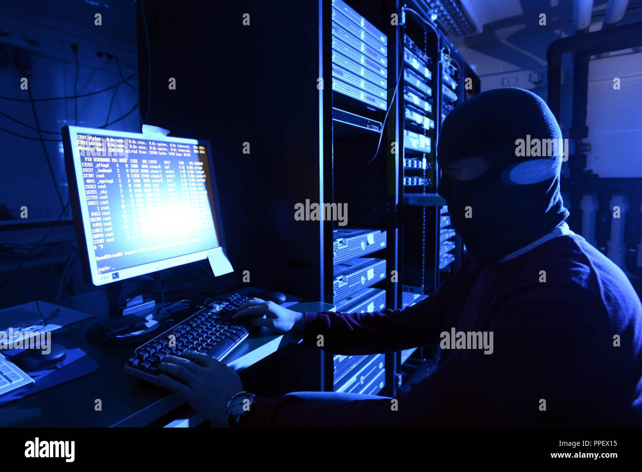 Representation of a hacker, symbolized by a mask at the University of ...