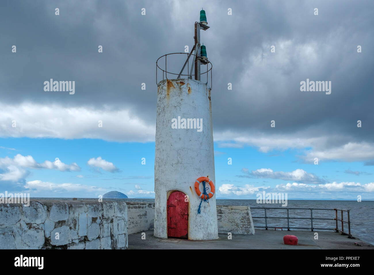 The old Girvan Harbour Beacon on a cloudy day in Scotland Stock Photo ...