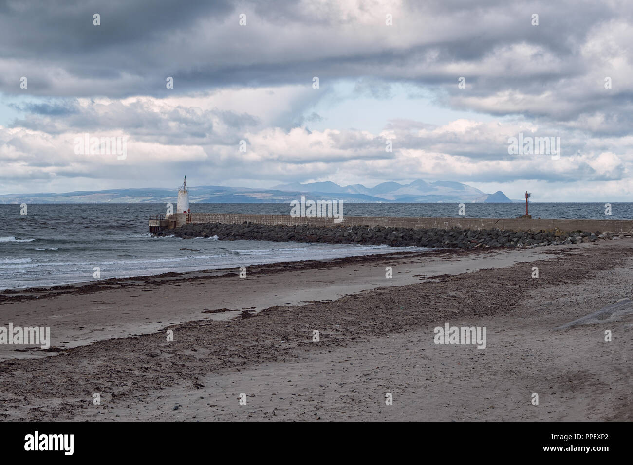 Girvan Bay and Harbour wall looking over to the end of the Isle of ...