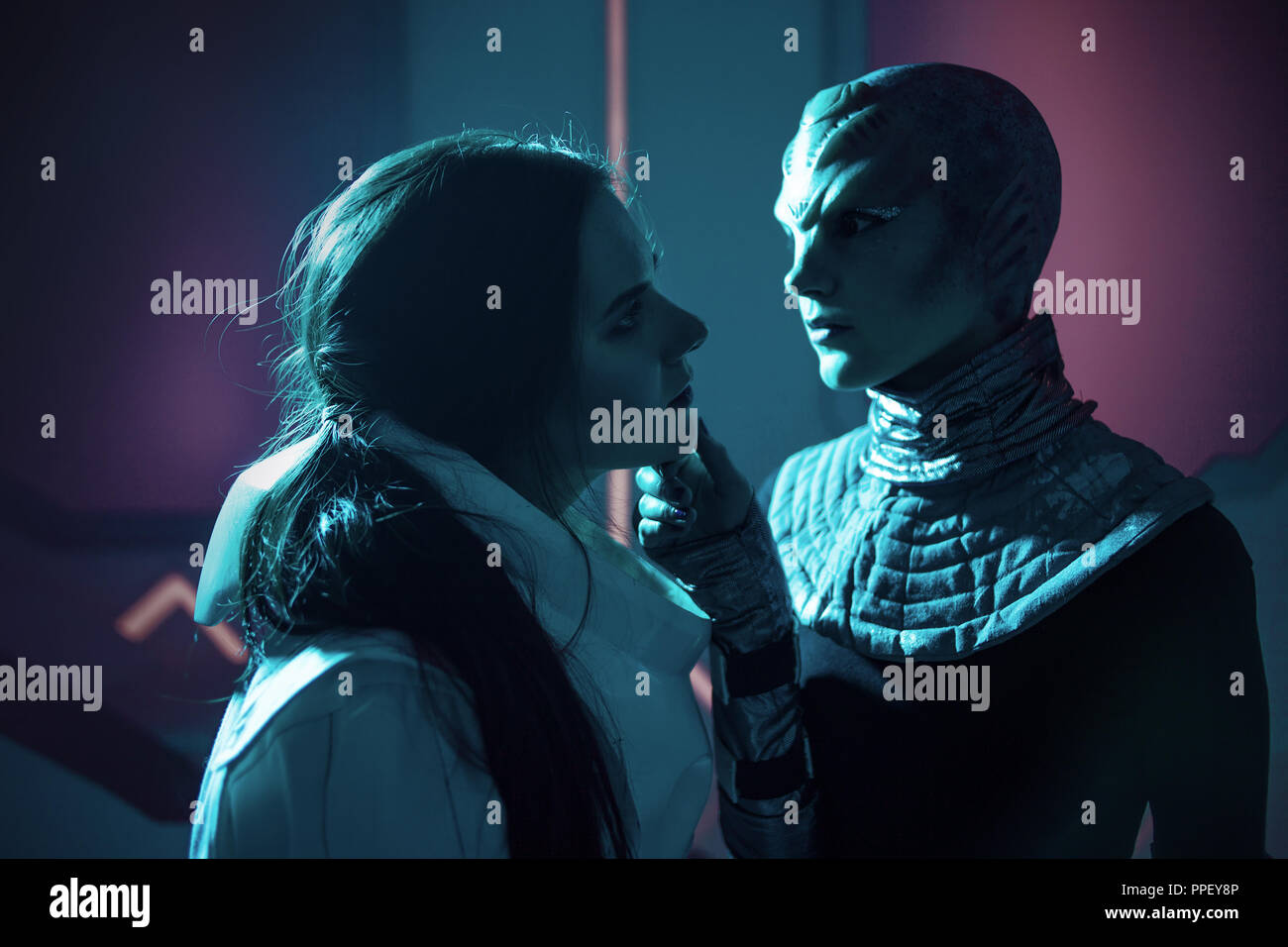 Woman and an alien look at each other. Contact with other civilizations ...