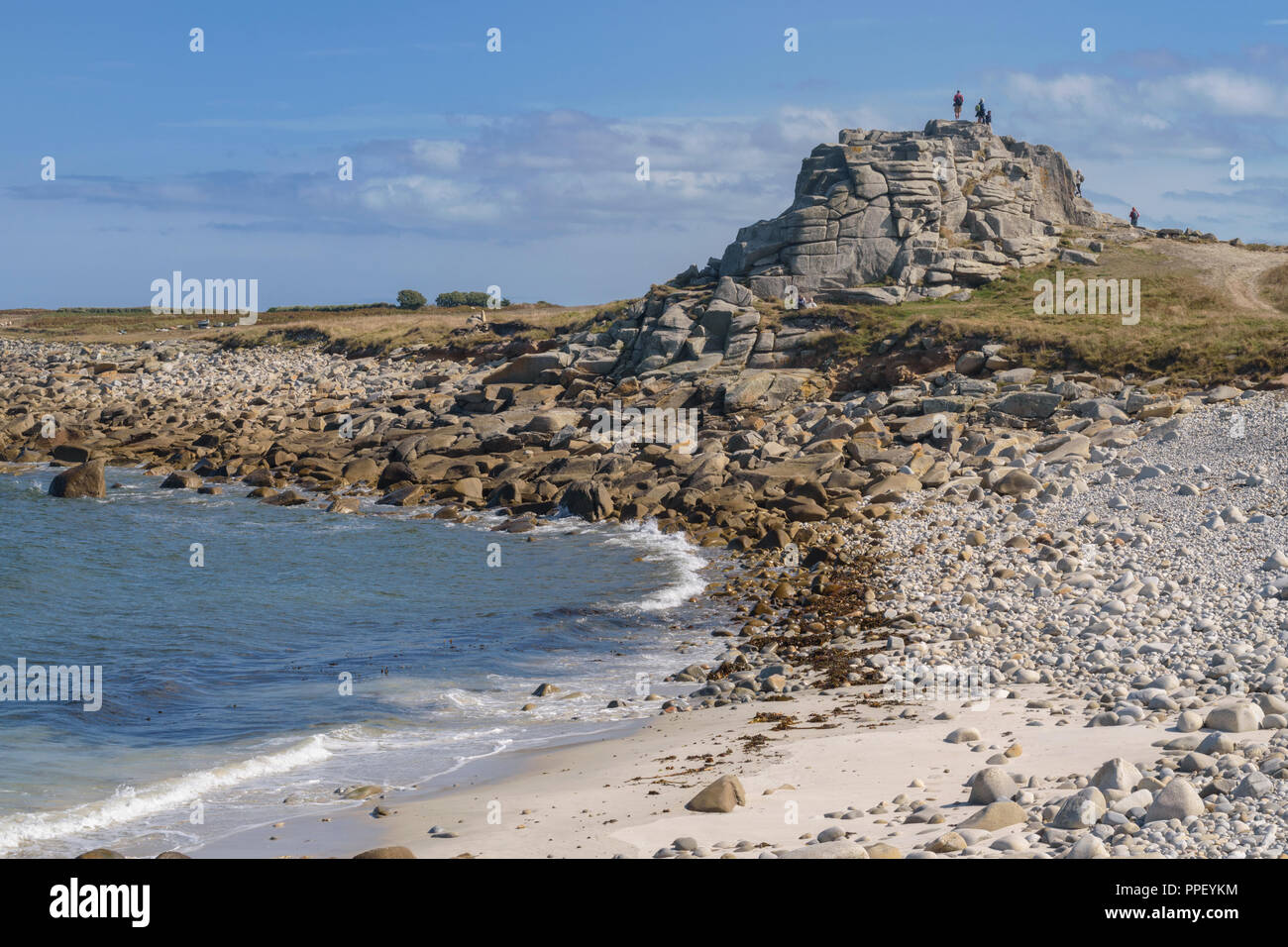 Beach with large granite outcrop Ile de Batz Roscoff Brittany France ...