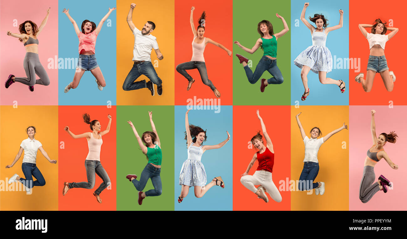 Freedom in moving. pretty happy young women and man jumping and ...