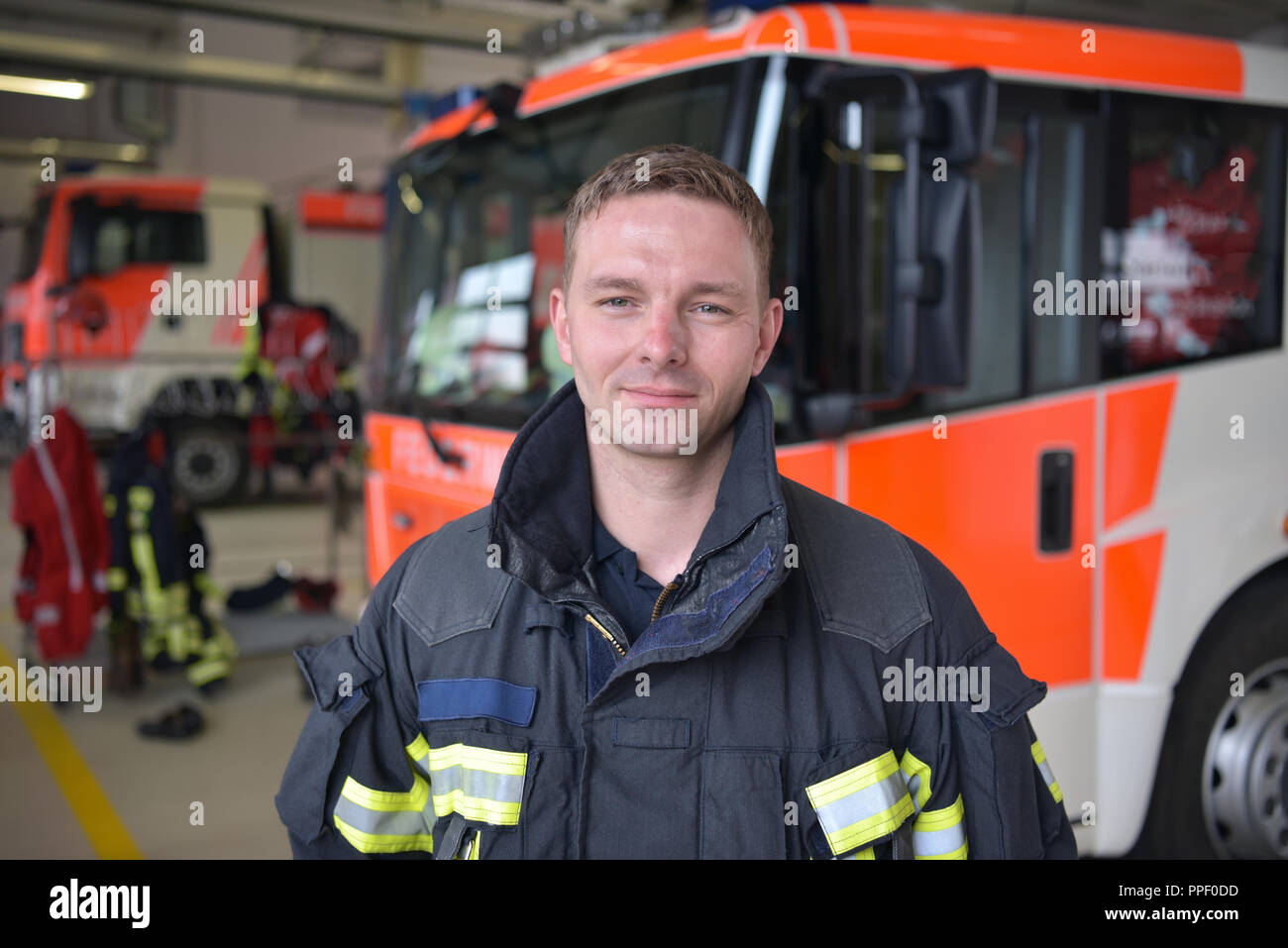 portrait of a firefighter in the operations centre at the fire-fighting ...