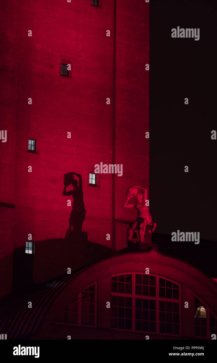 The facade of the Deutsches Museum shines in colorful lighting for the ...