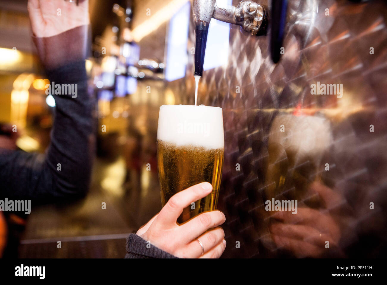 Tapping beer can hi-res stock photography and images - Alamy