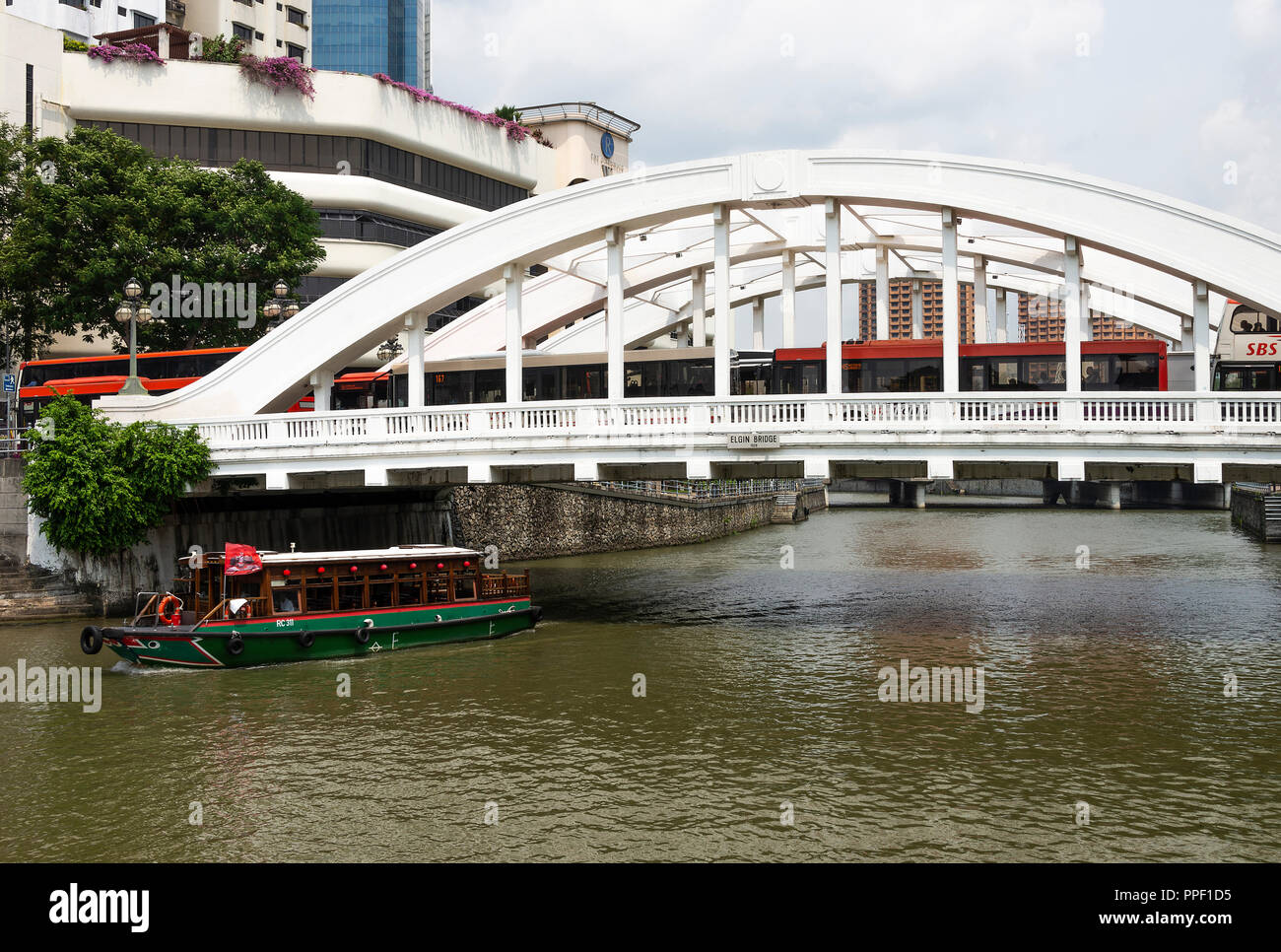The Arched Elgin Bridge Crossing the Singapore River with the Riverside ...