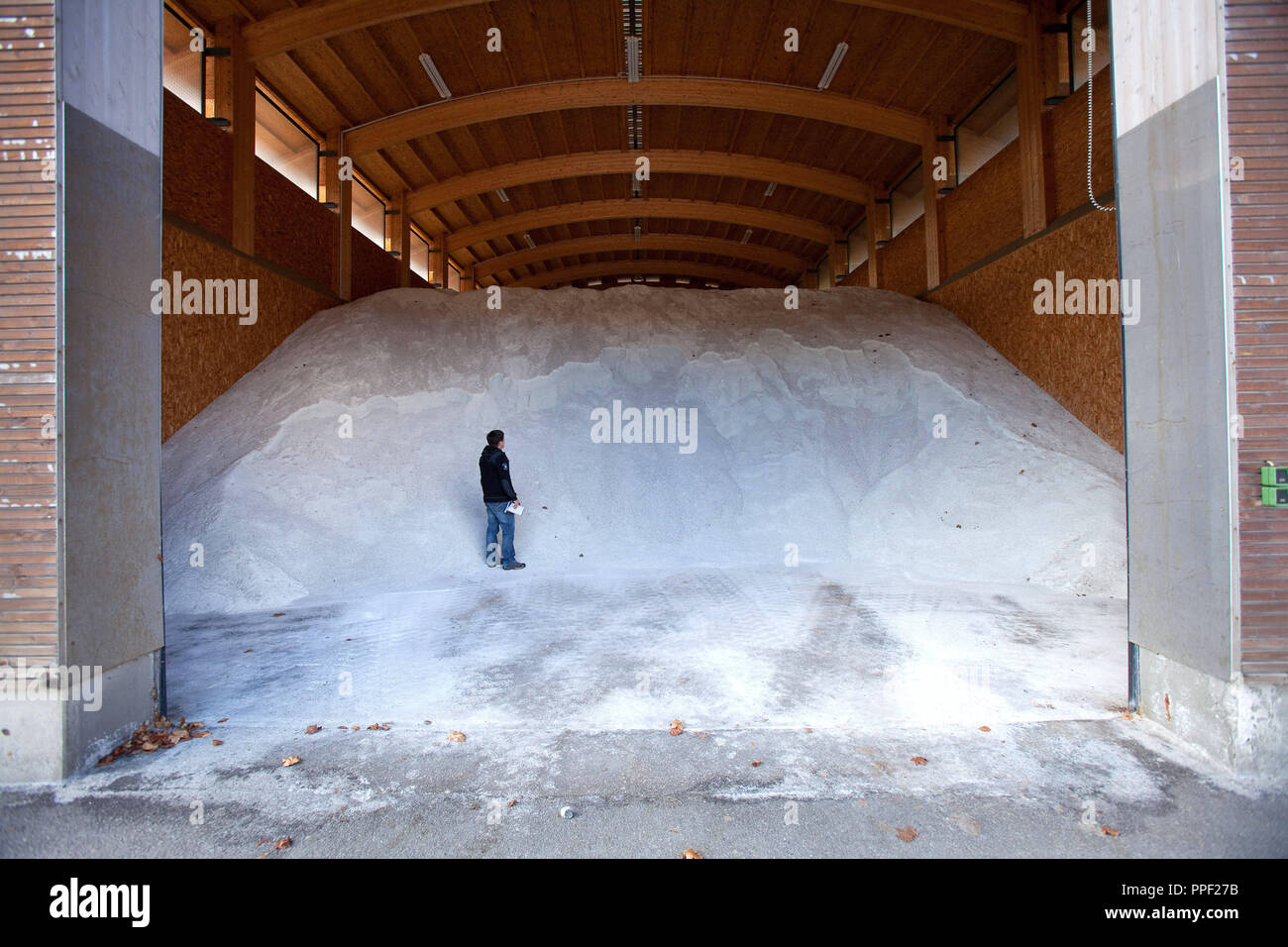At the road maintenance depot's hall tons of salt is stored for the ...