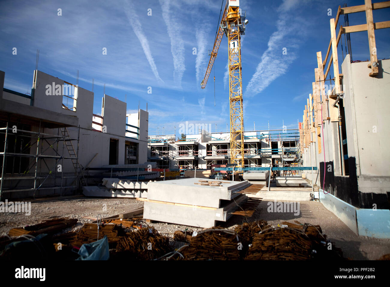 A construction site of Gewofag with shell construction and scaffolding ...