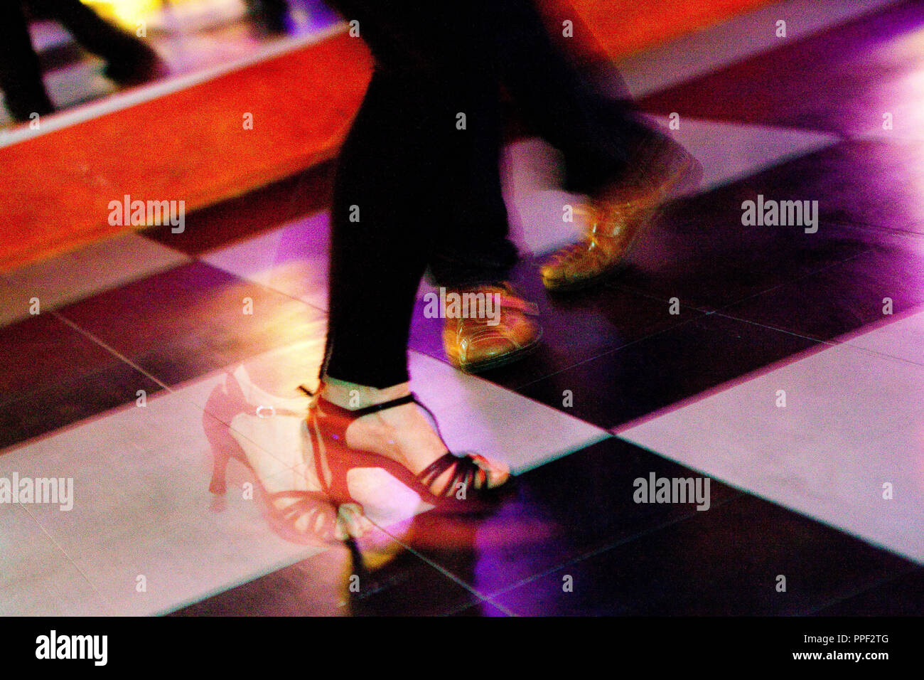 Salsa dancers on the dance floor at the dancing school 'Salsabor' on ...