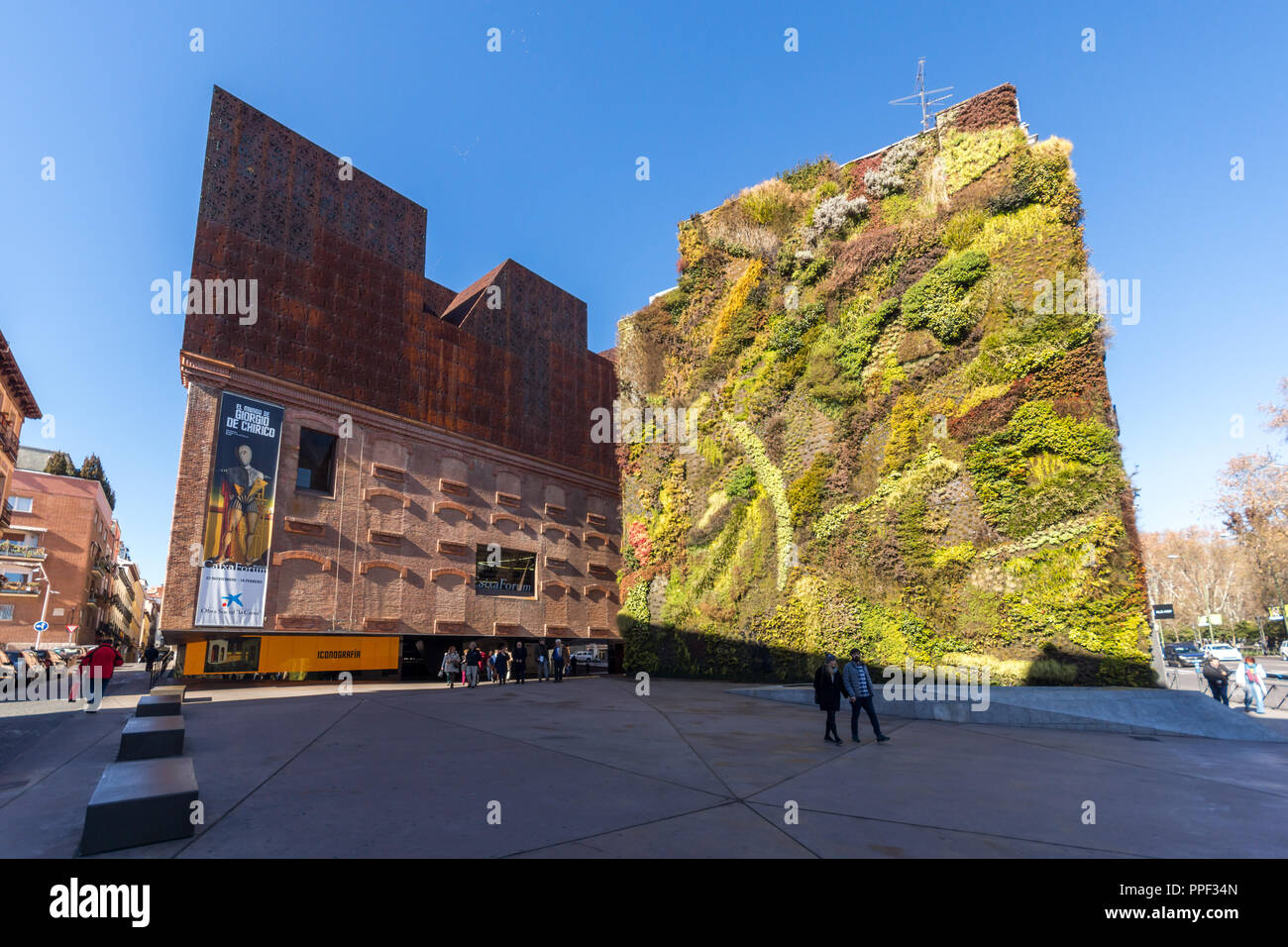 MADRID, SPAIN - JANUARY 22, 2018: Vertical garden wall and CaixaForum ...