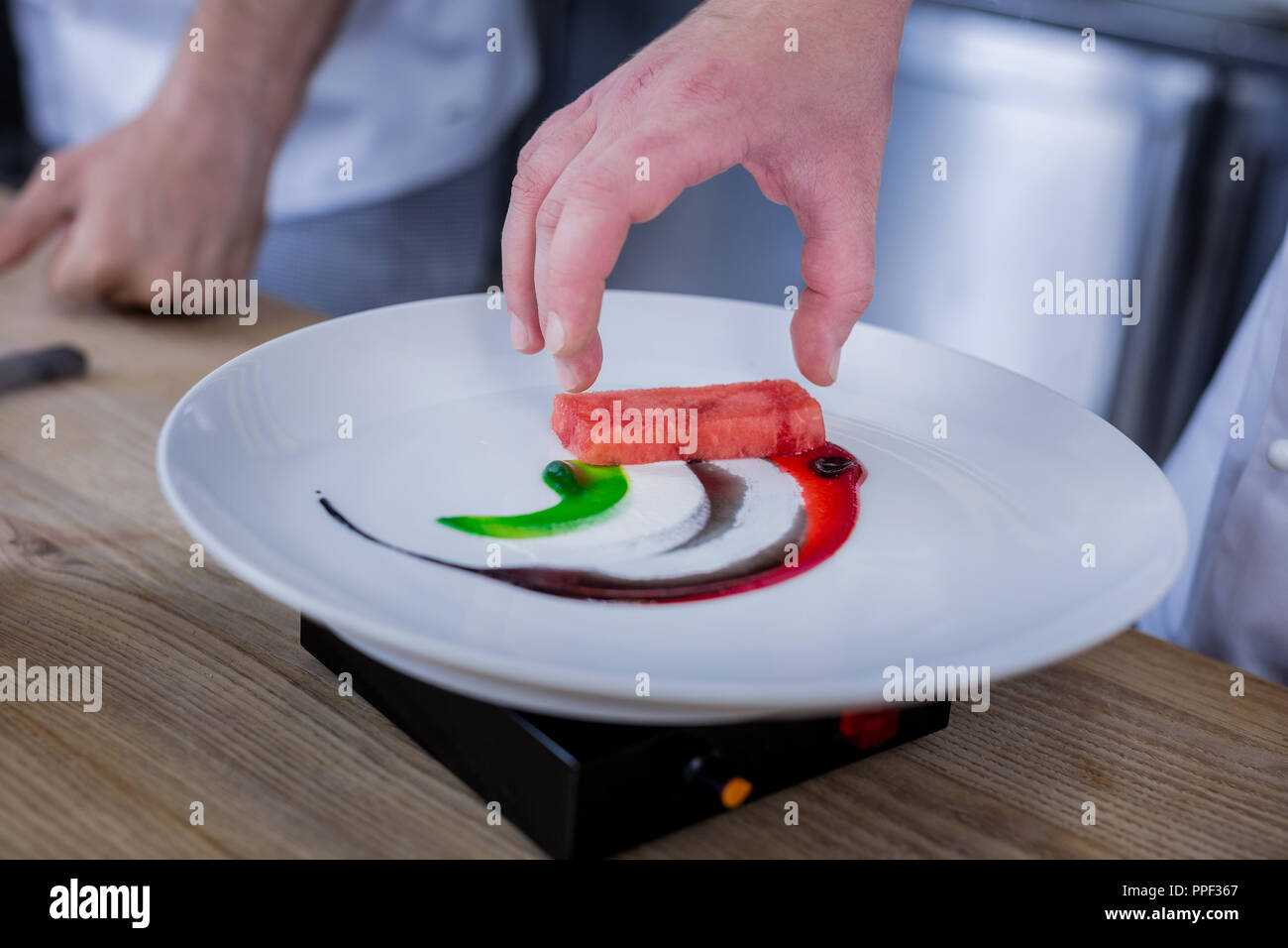 Great cook preparing something sweet and tasty Stock Photo - Alamy