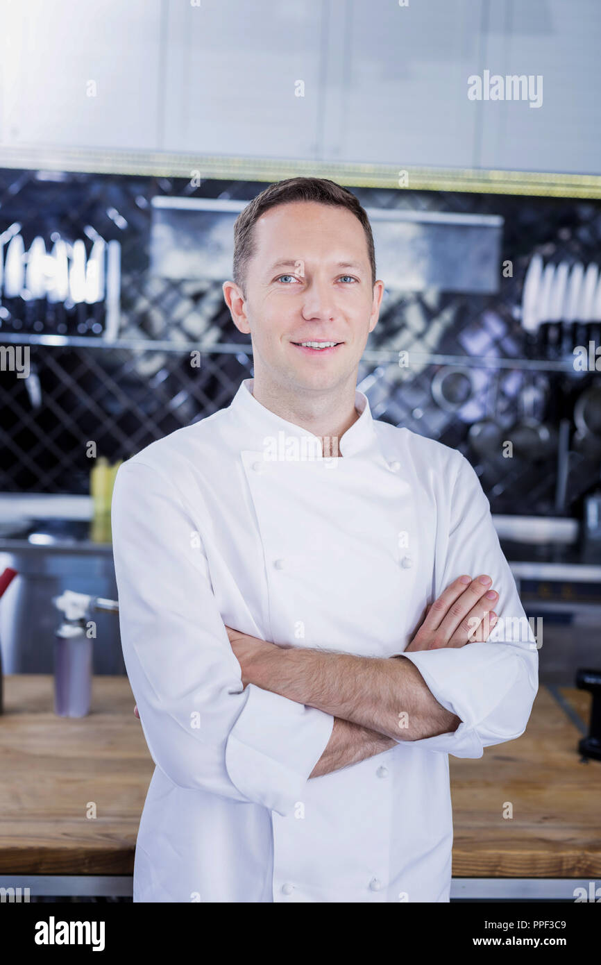 Handsome cook hi-res stock photography and images - Alamy