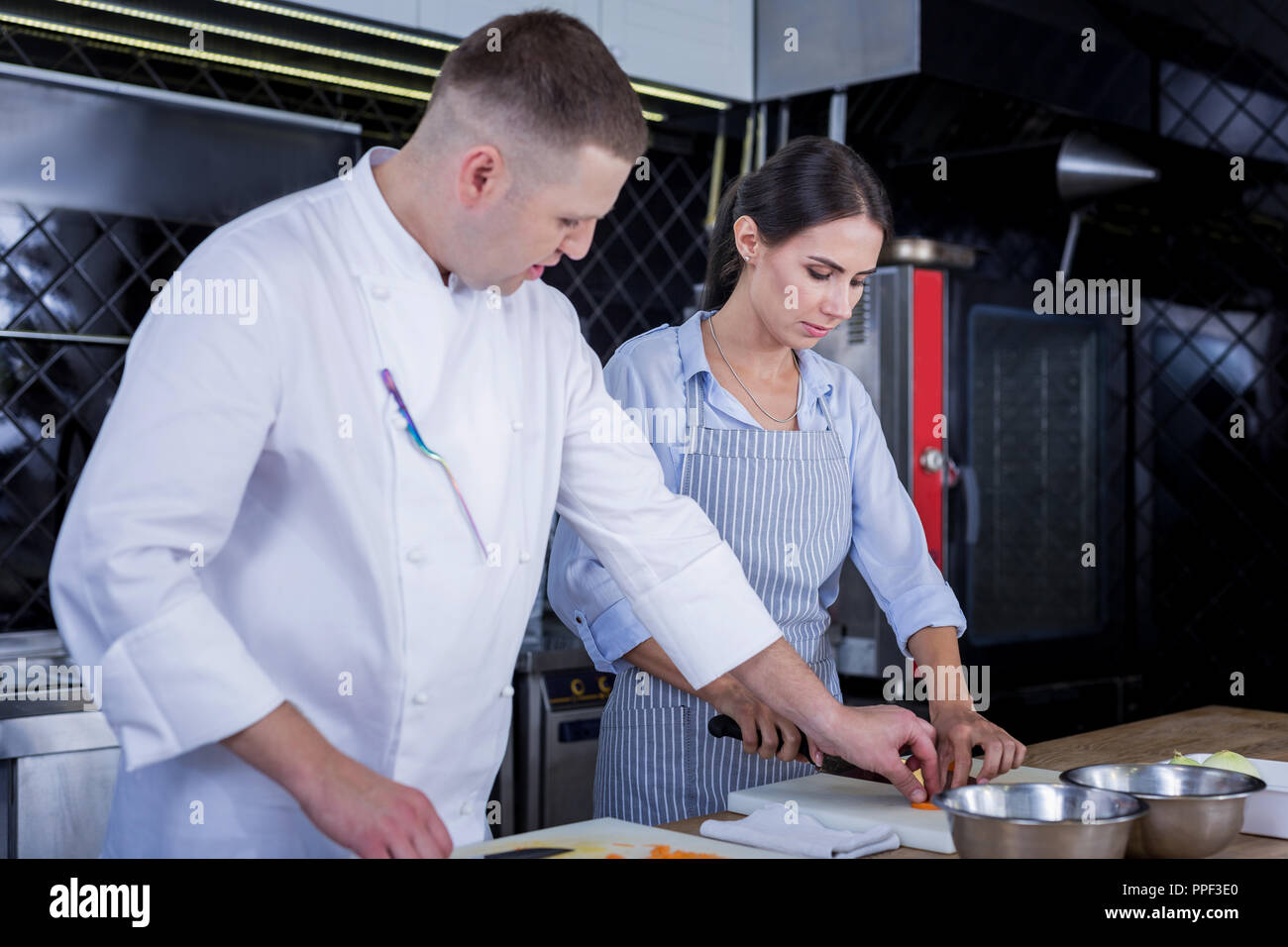 A lady cooking food hi-res stock photography and images - Alamy