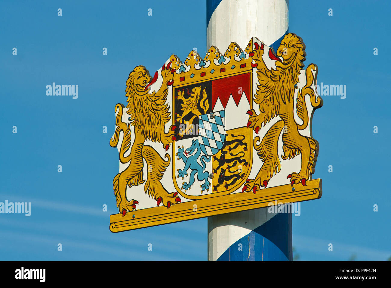Coat of arms of Bavaria with the Bavarian lions at the Maypole in ...