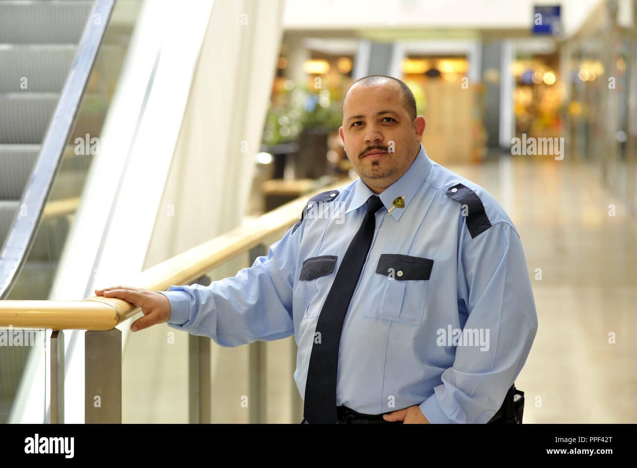 Security guard at the shopping center Riem Arcaden in Munich Riem Stock ...