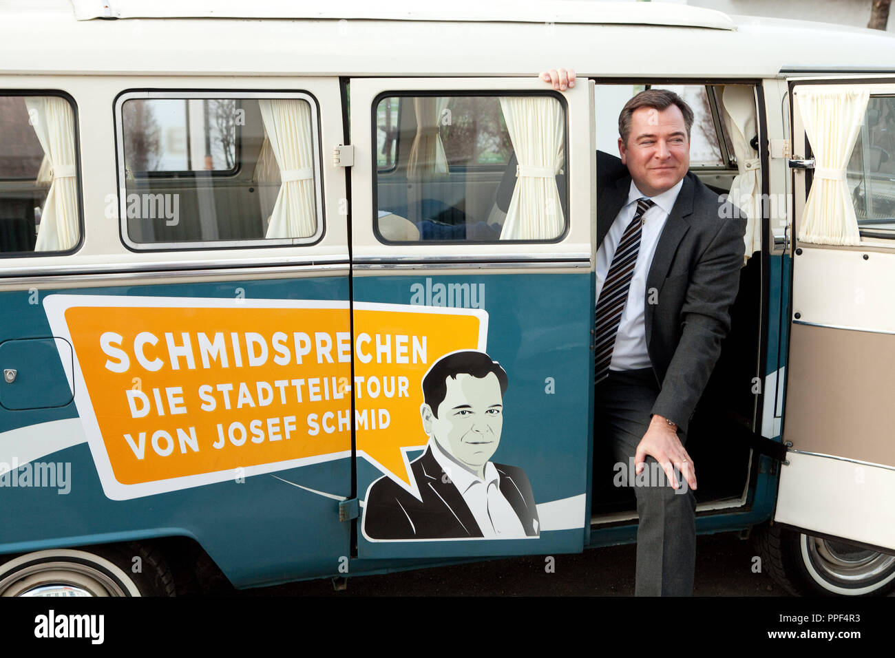 The Munich-based mayor candidate Josef Schmid tours with an old VW bus ...