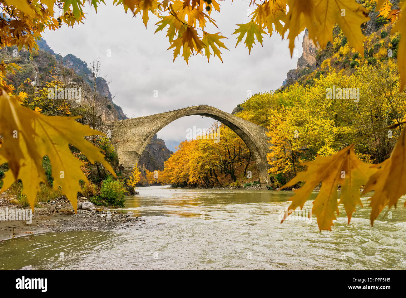 Old stone bridge in Konitsa and Aoos River an autumn day,Epirus ...