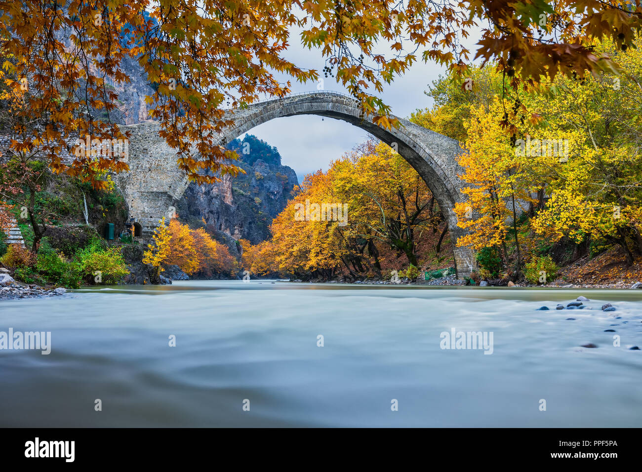 Old stone bridge in Konitsa and Aoos River an autumn day,Epirus ...