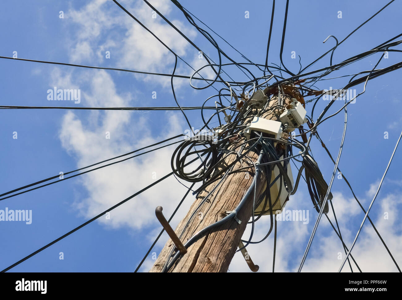 Dangerous mess of electric cables with the sky in the background Stock ...
