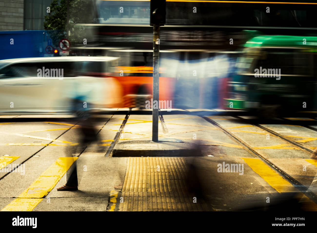 Pedestrians crossing the busy street on Hong Kong Stock Photo - Alamy