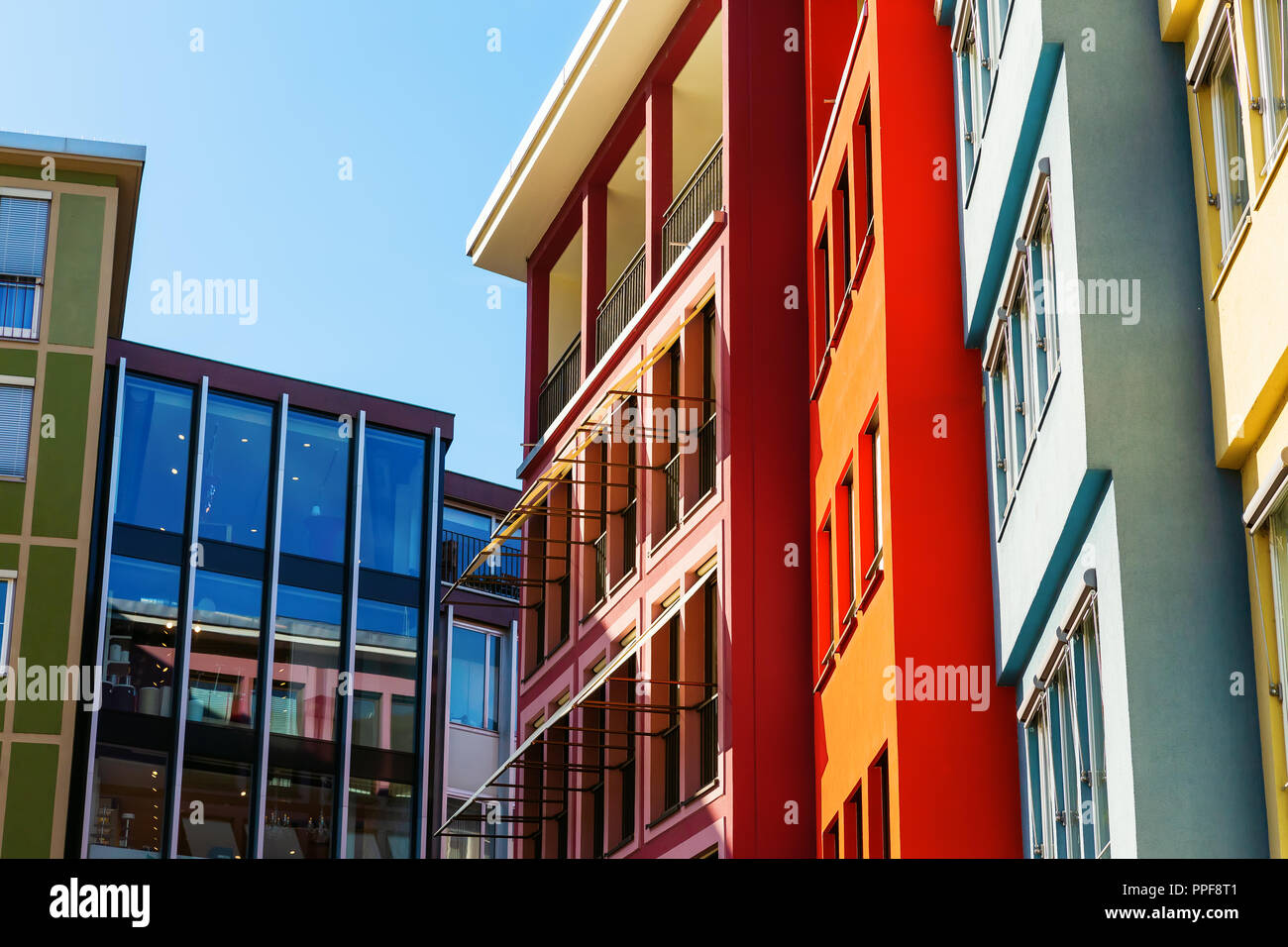 picture of colorful house facades along a square in the city of ...
