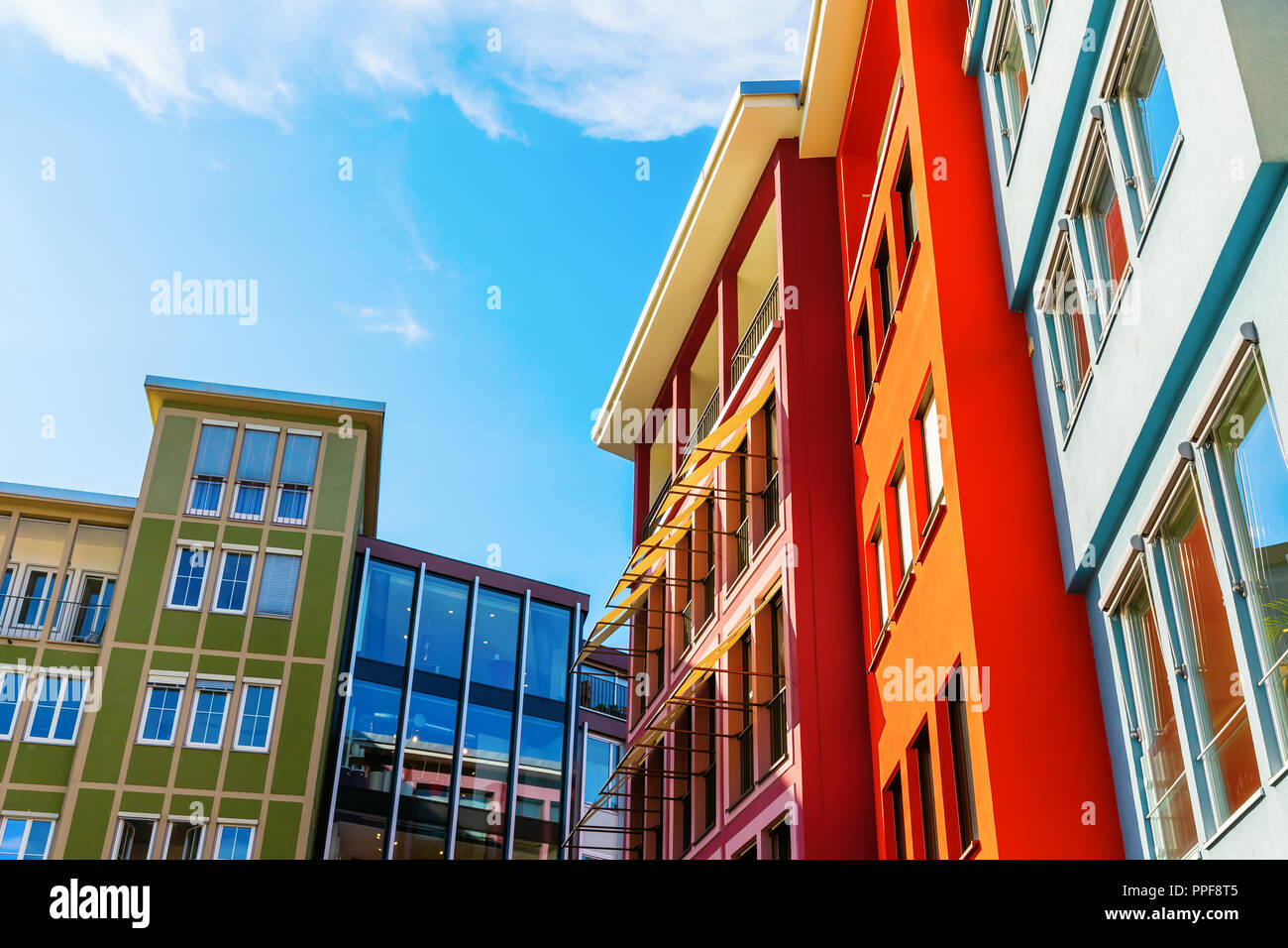 picture of colorful house facades along a square in the city of ...