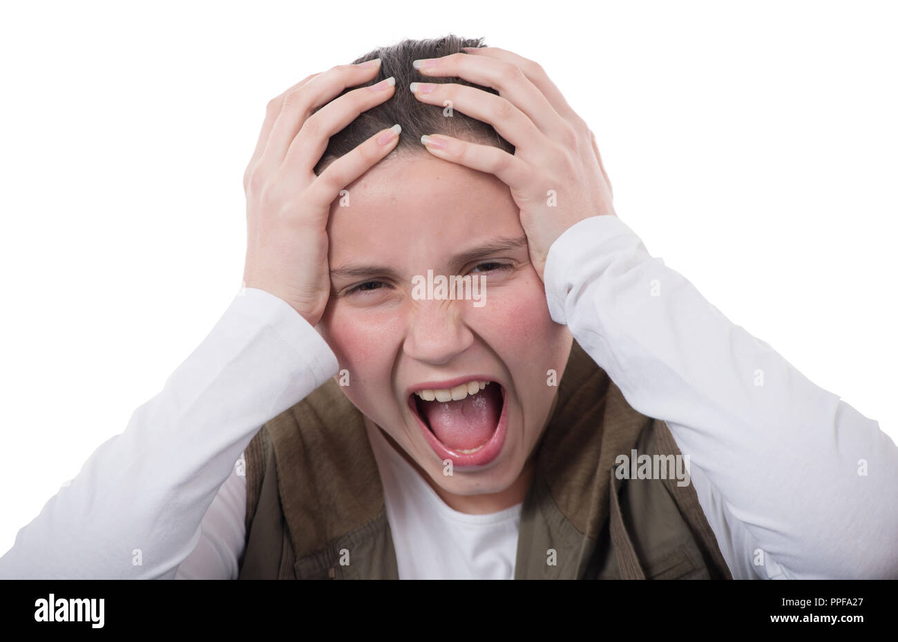 portrait of a young angry teenager isolated on white Stock Photo - Alamy