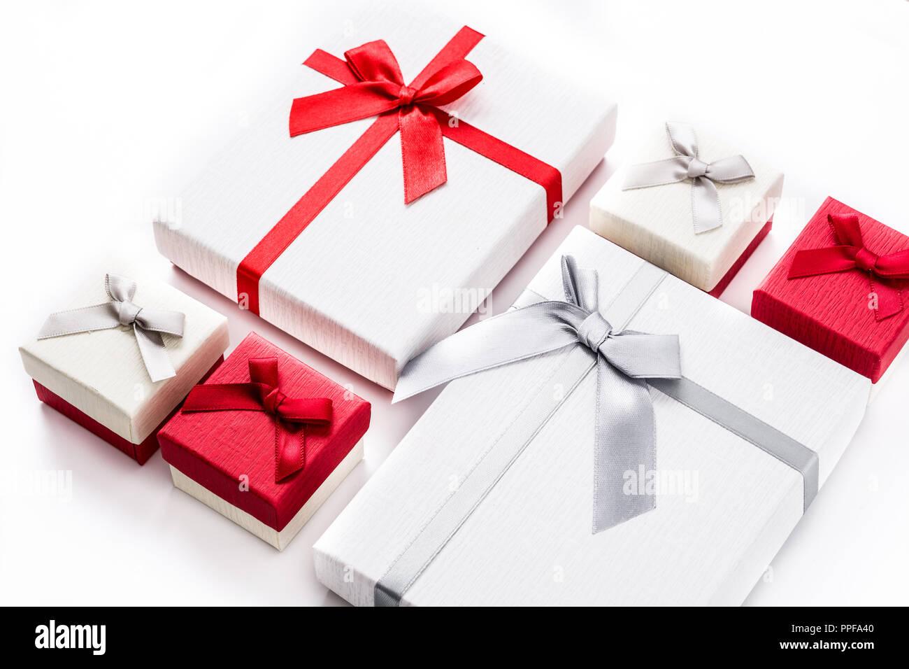 White and red gift boxes isolated on white background Stock Photo - Alamy