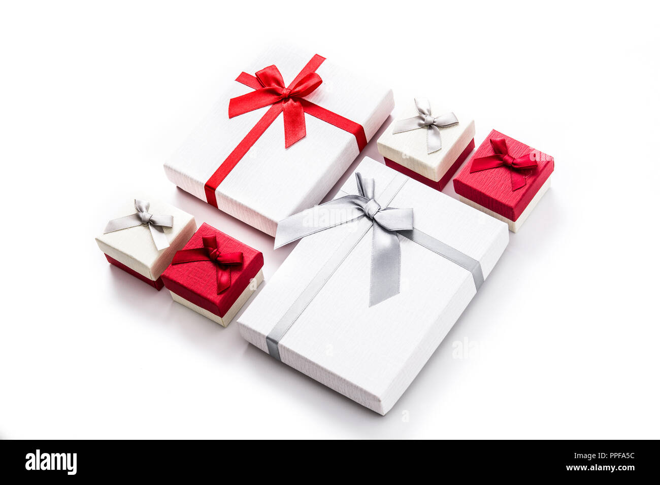 White and red gift boxes isolated on white background Stock Photo - Alamy