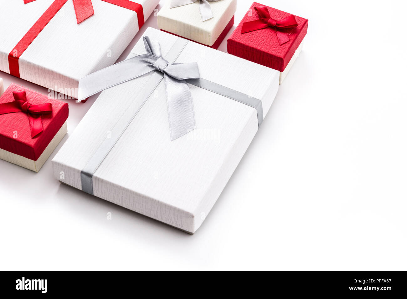 White and red gift boxes isolated on white background Stock Photo - Alamy