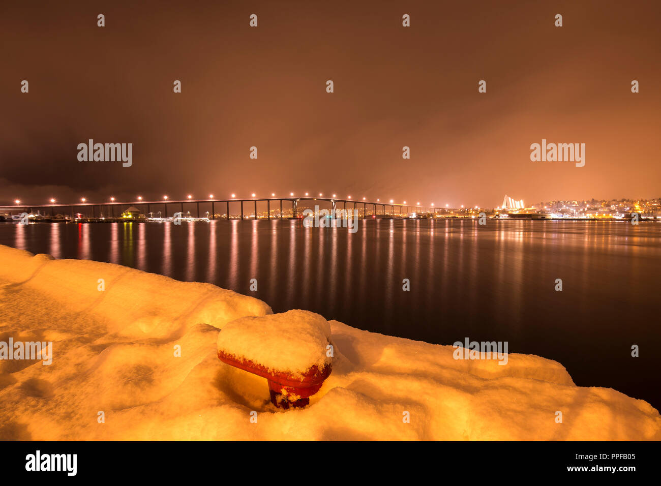 Night view of the city of Tromso, Troms Norway, during dusk. A winter ...