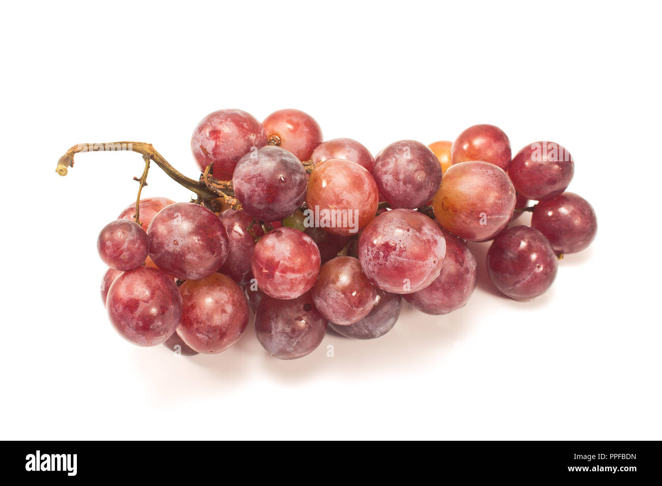 Red grapes isolated on white background Stock Photo - Alamy