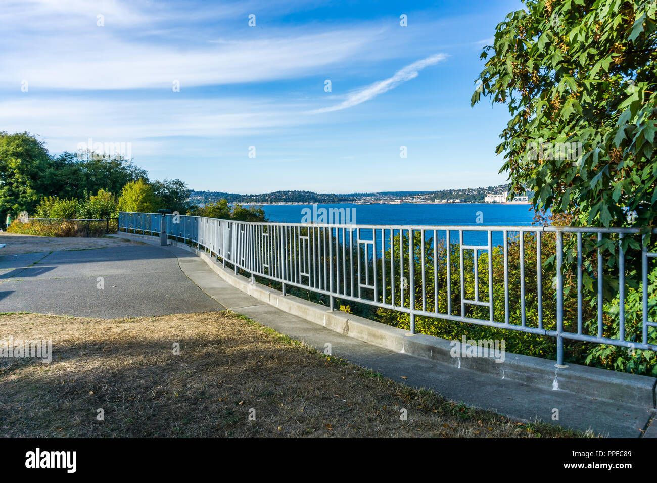 A view of a metal fence at a lookout in West Seattle Stock Photo - Alamy